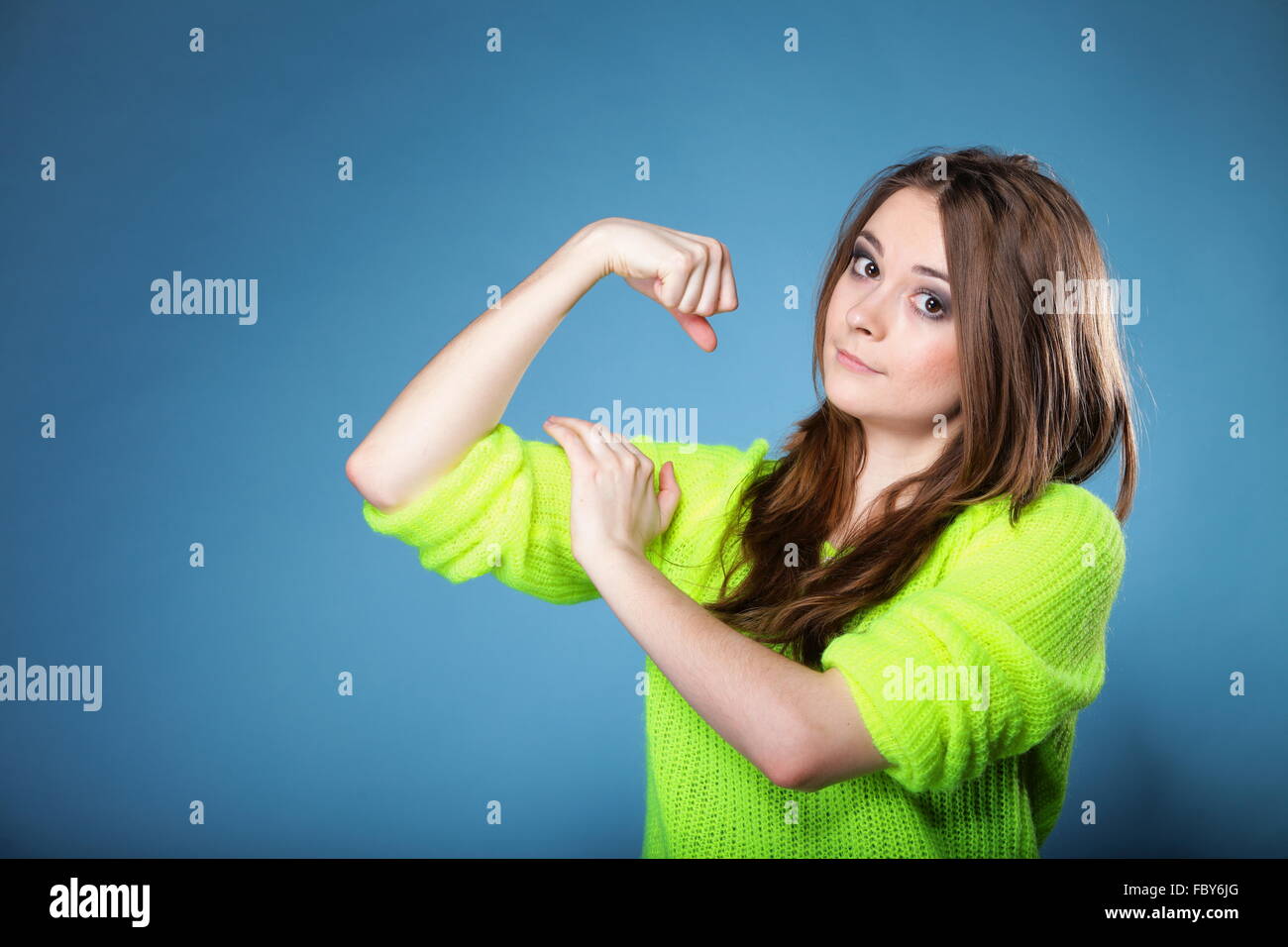Girl shows her muscles strength hi-res stock photography and images - Alamy