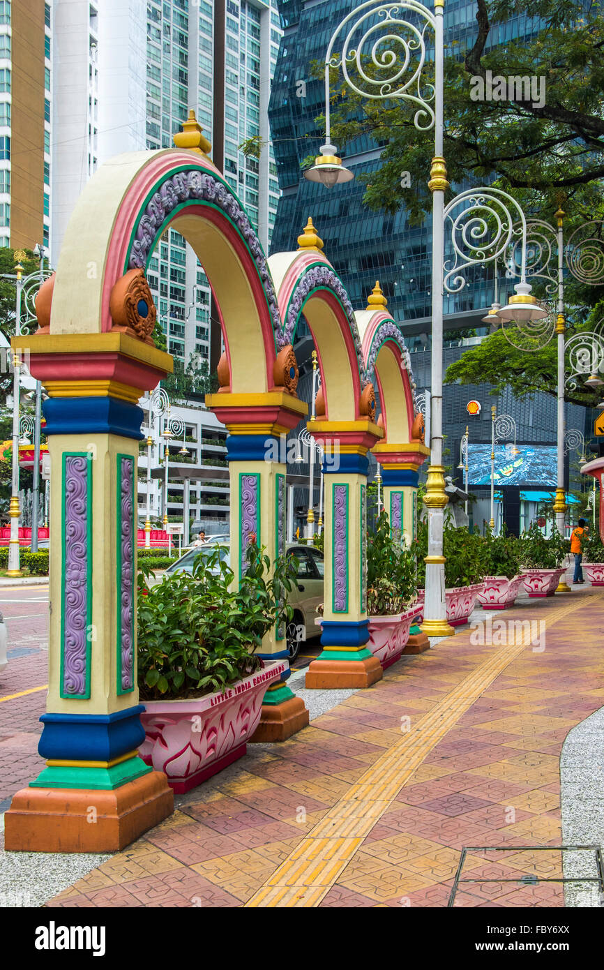 People walking near traditional Indian Arches in Little India ...