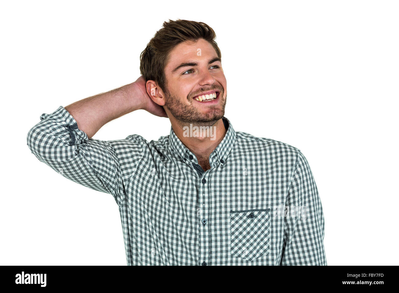 Smiling man with hand behind head Stock Photo - Alamy