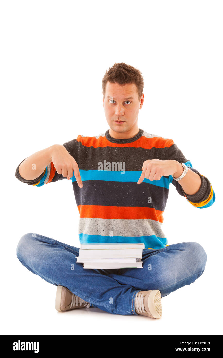 Man college student sitting and showing offering books isolated Stock ...