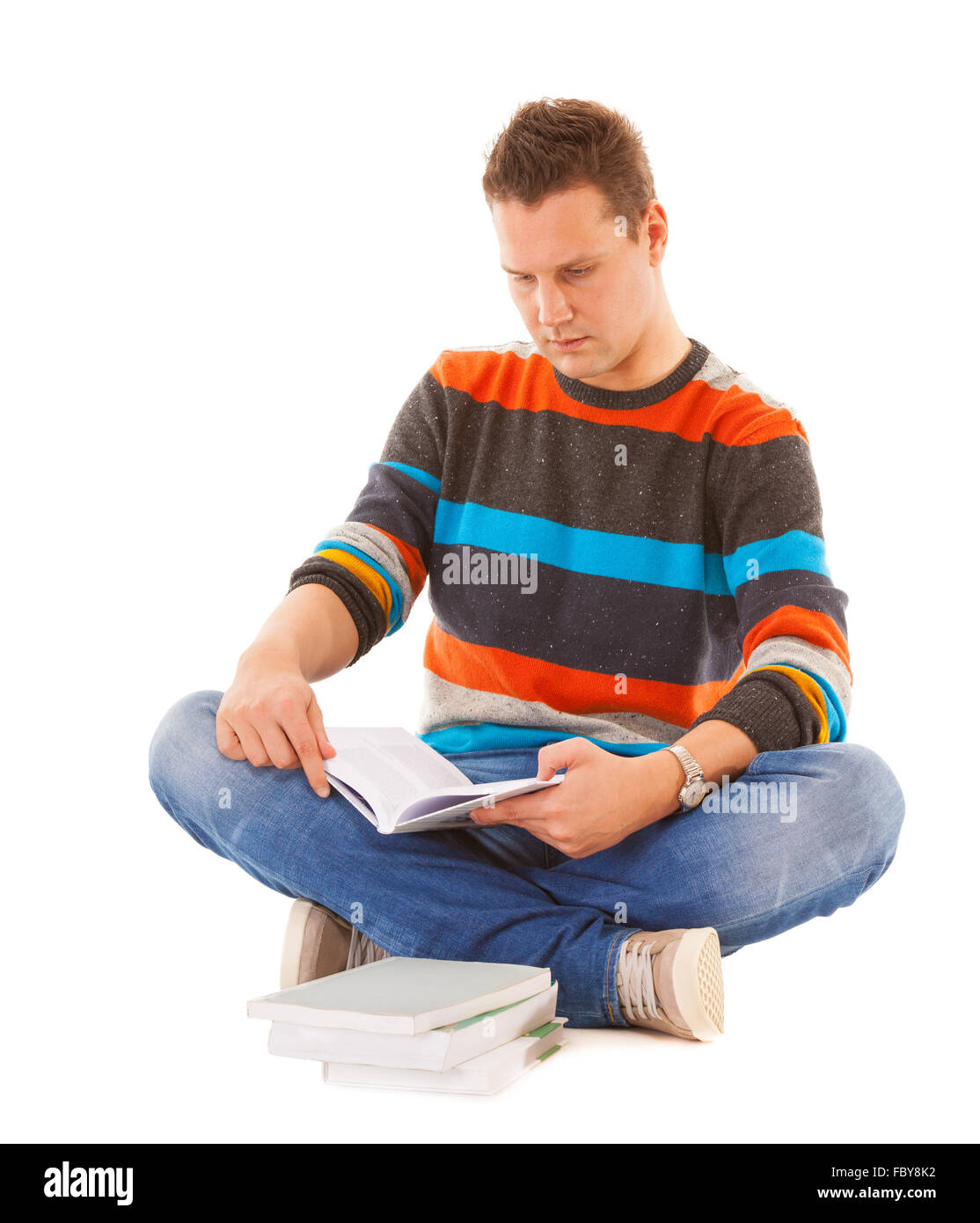Student sitting reading book Cut Out Stock Images & Pictures - Alamy