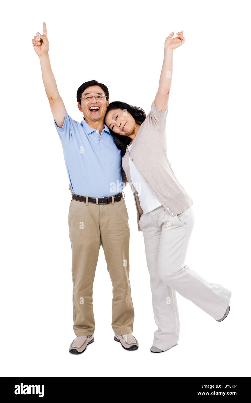 Smiling couple holding each other Stock Photo - Alamy