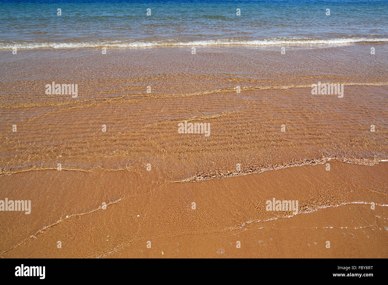shallow of sea on sand beach Stock Photo - Alamy