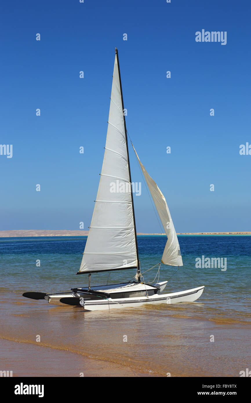 sailing catamaran on beach Stock Photo - Alamy