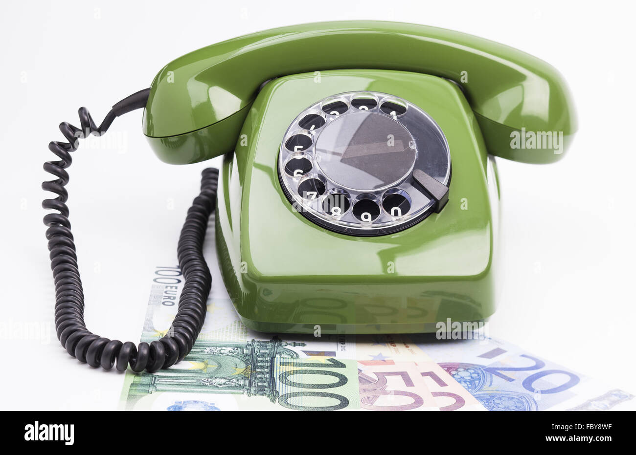 Telephone and money Stock Photo - Alamy
