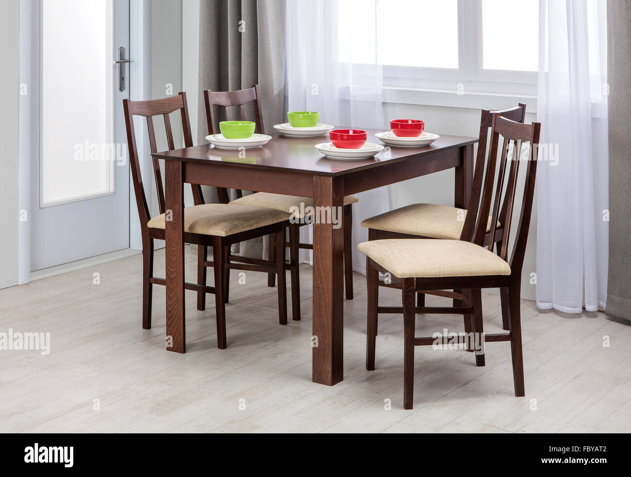 Simple wooden dinning table and chairs in interior - studio ambient ...