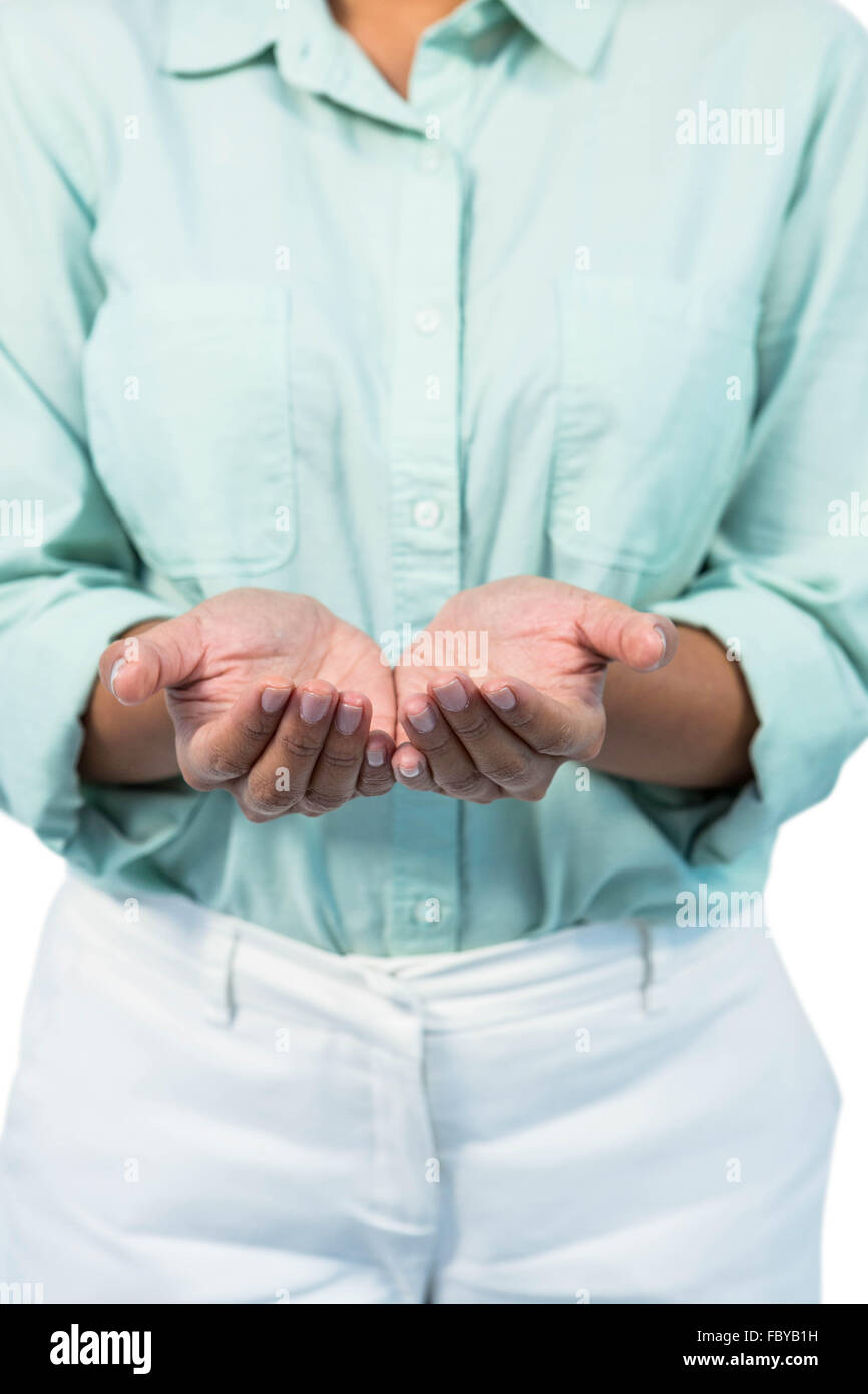 Mid section of a businesswoman holding something Stock Photo - Alamy