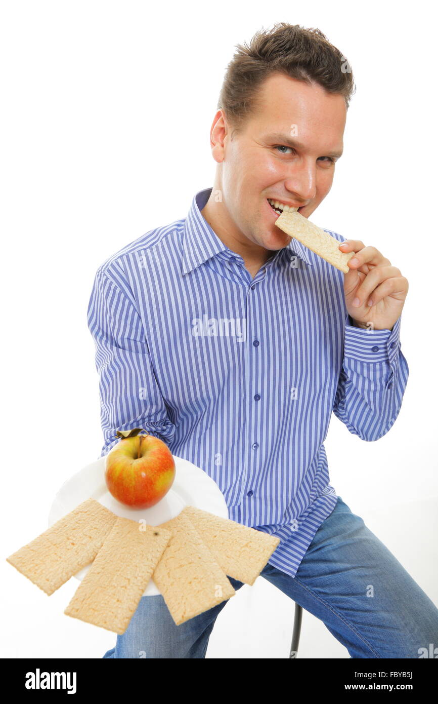 Man eating crispbread not woman hi-res stock photography and images - Alamy