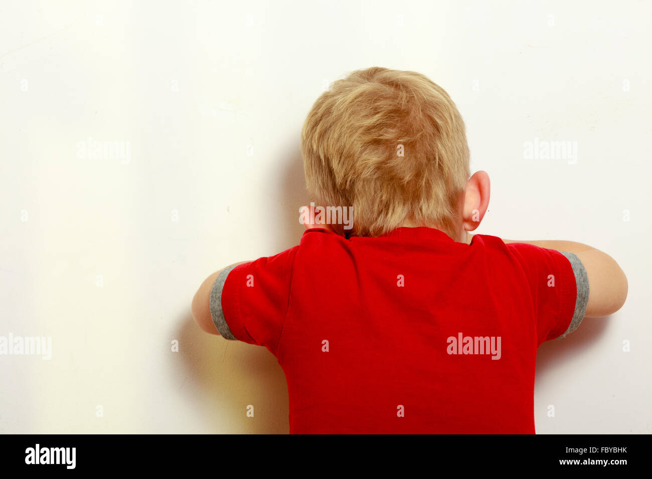 Happy childhood. Blond boy child kid covering face. Play Stock Photo ...