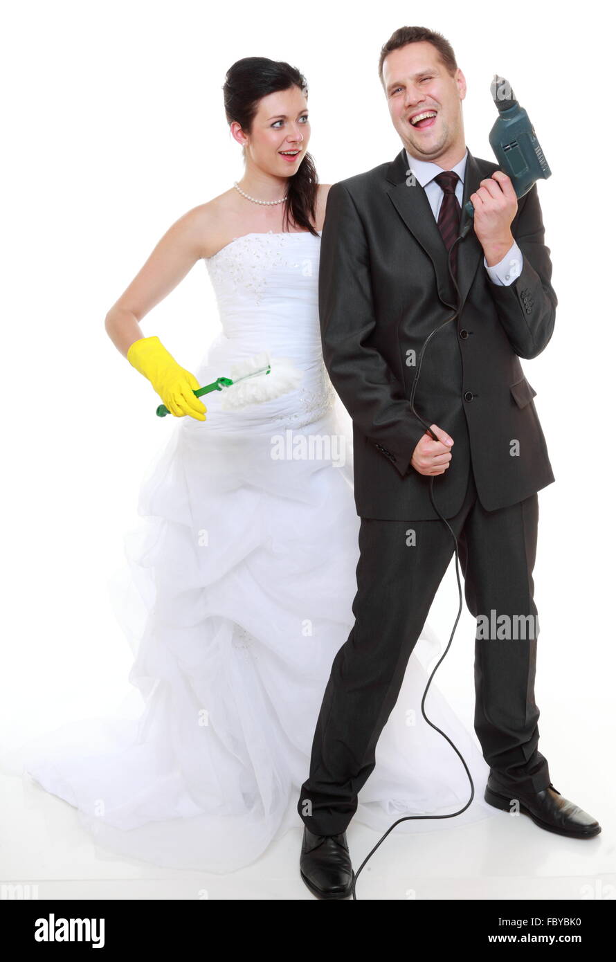 Humorous funny young couple bride groom in domestic role Stock Photo ...