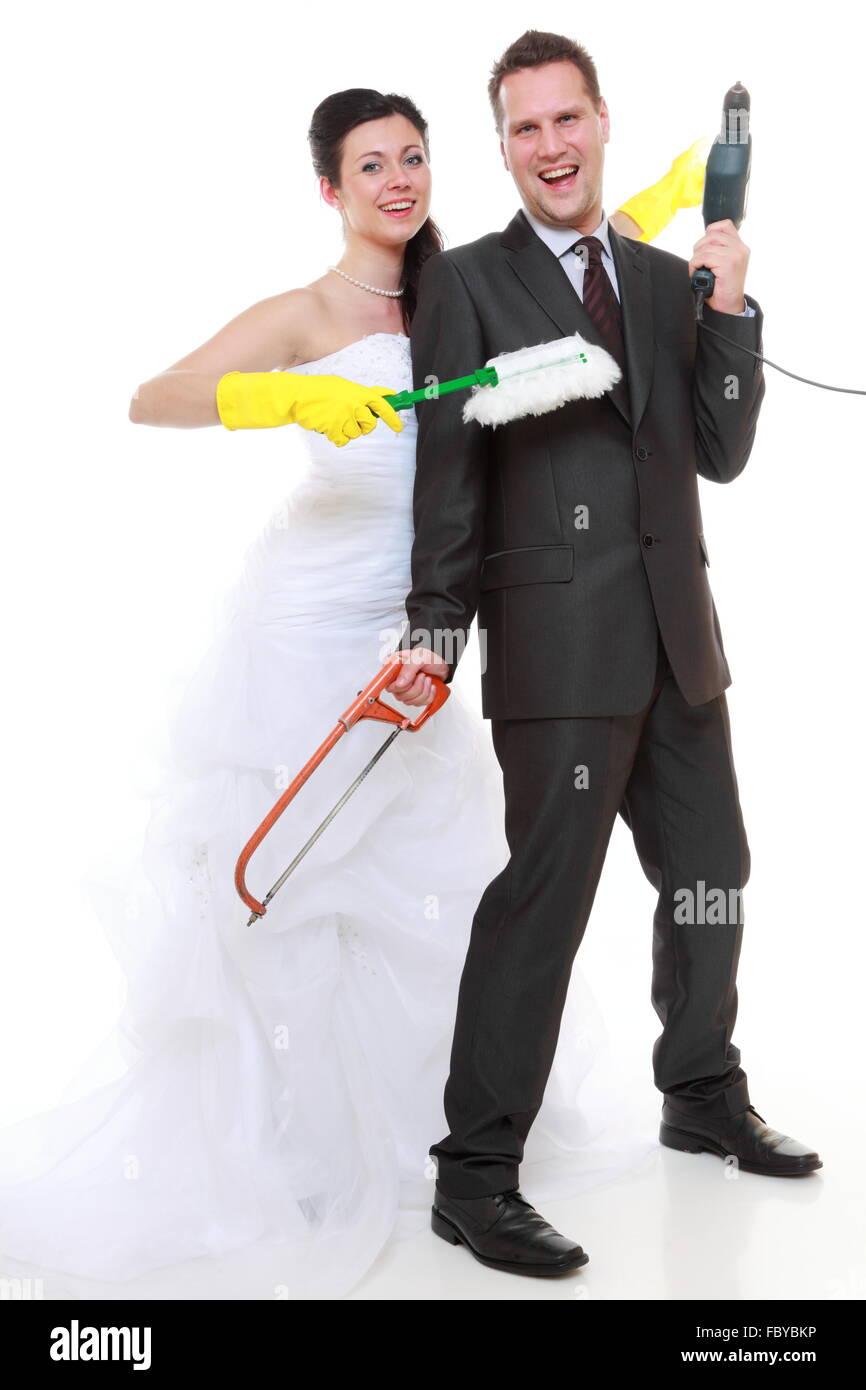 Humorous funny young couple bride groom in domestic role Stock Photo ...