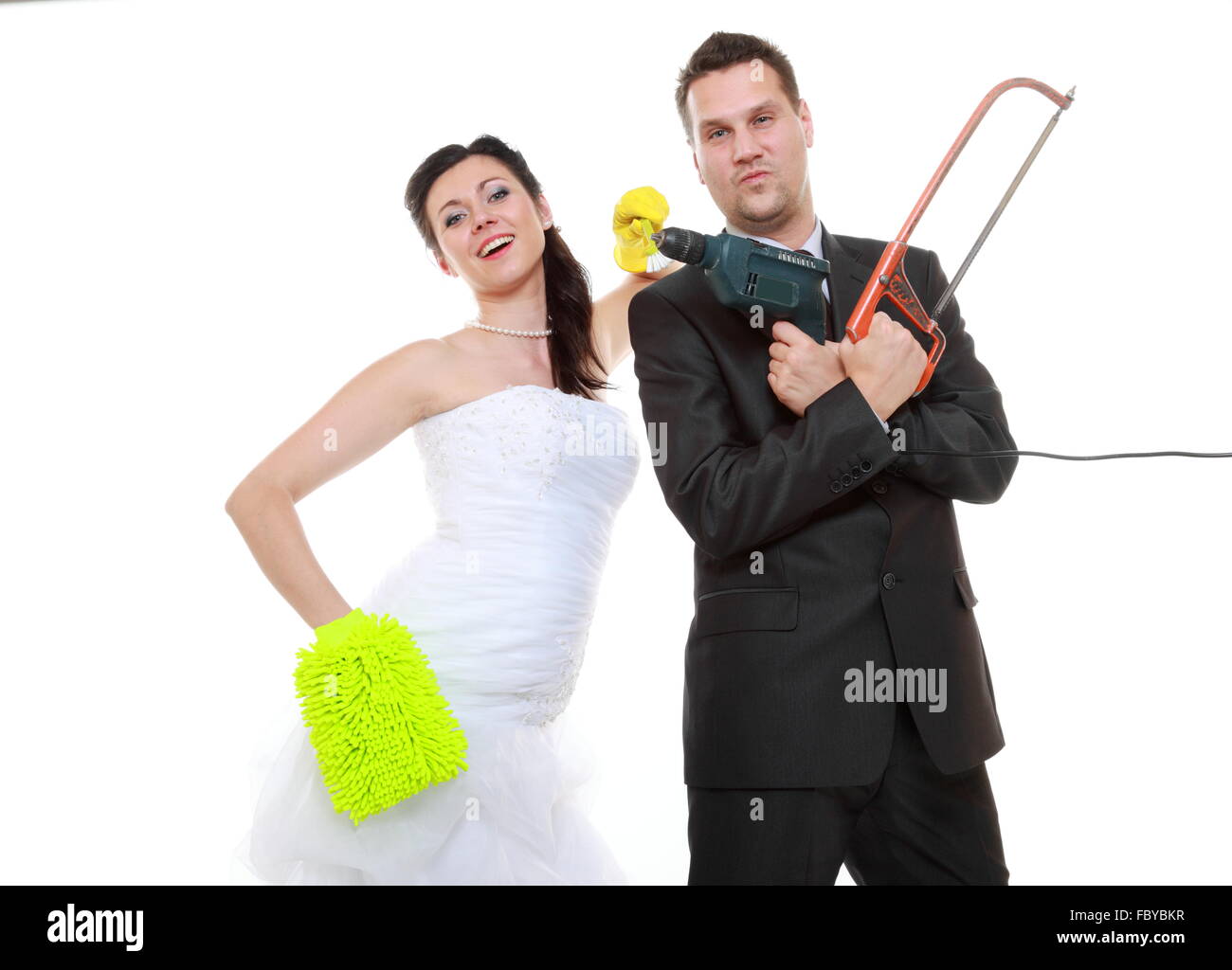 Humorous funny young couple bride groom in domestic role Stock Photo ...