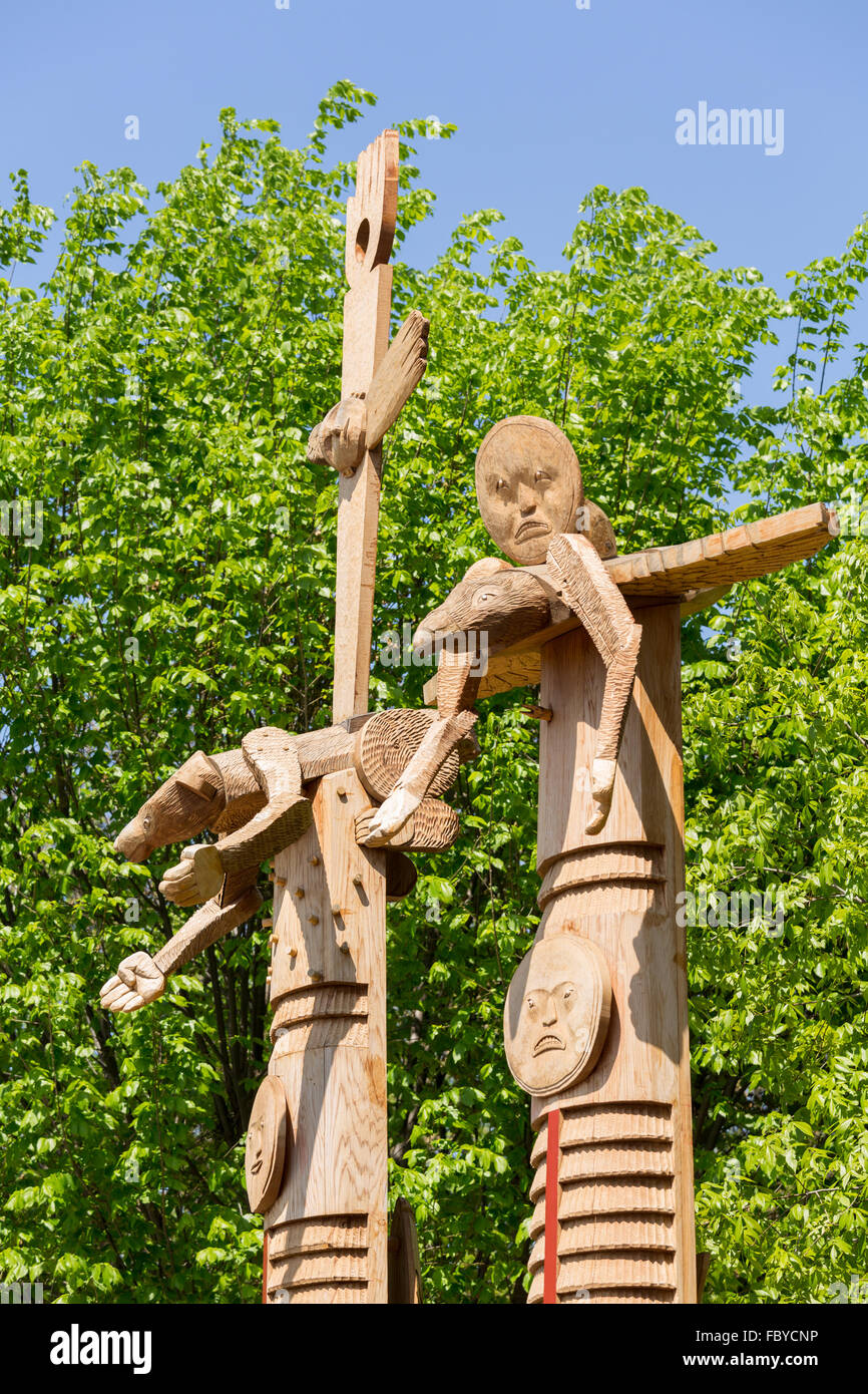 Statue of totem poles outside American Indian Museum Stock Photo - Alamy