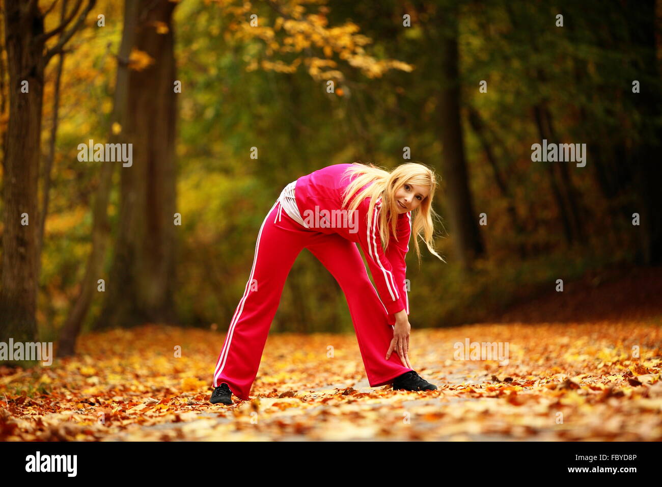Healthy active lifestyle. Fitness woman doing exercise outdoor Stock ...
