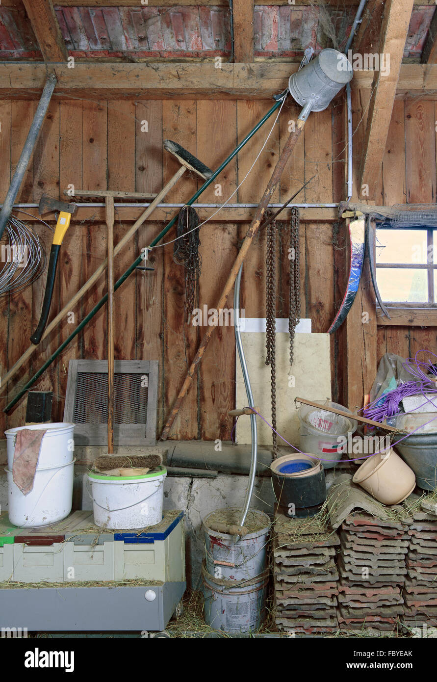 tools on the wall of an old wooden barn Stock Photo - Alamy