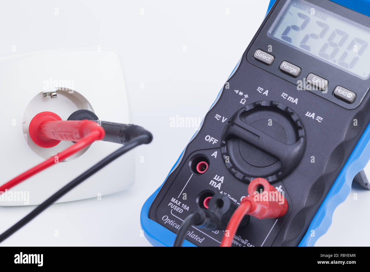 Plug socket and multimeter Stock Photo - Alamy