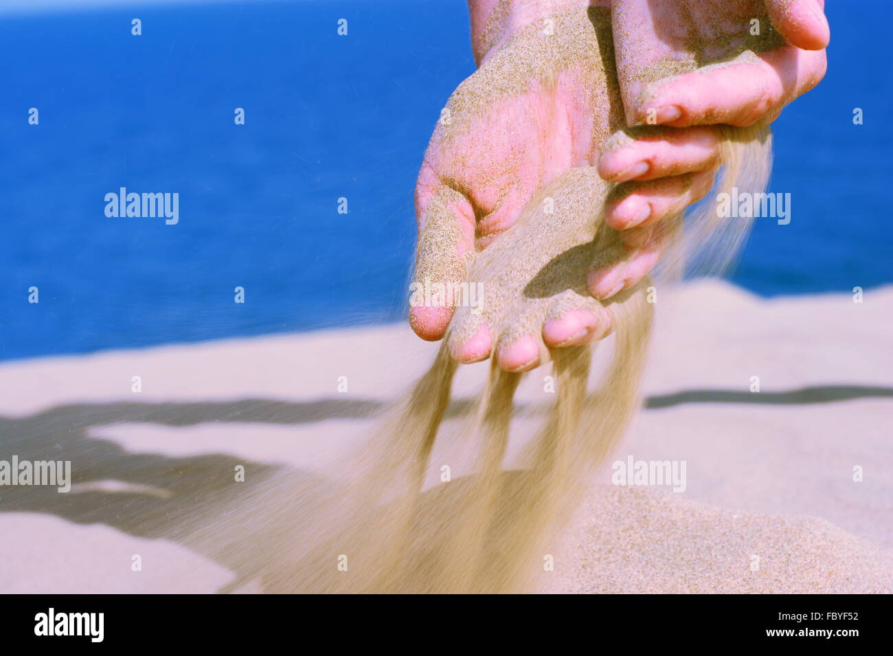 sand in female hand Stock Photo - Alamy