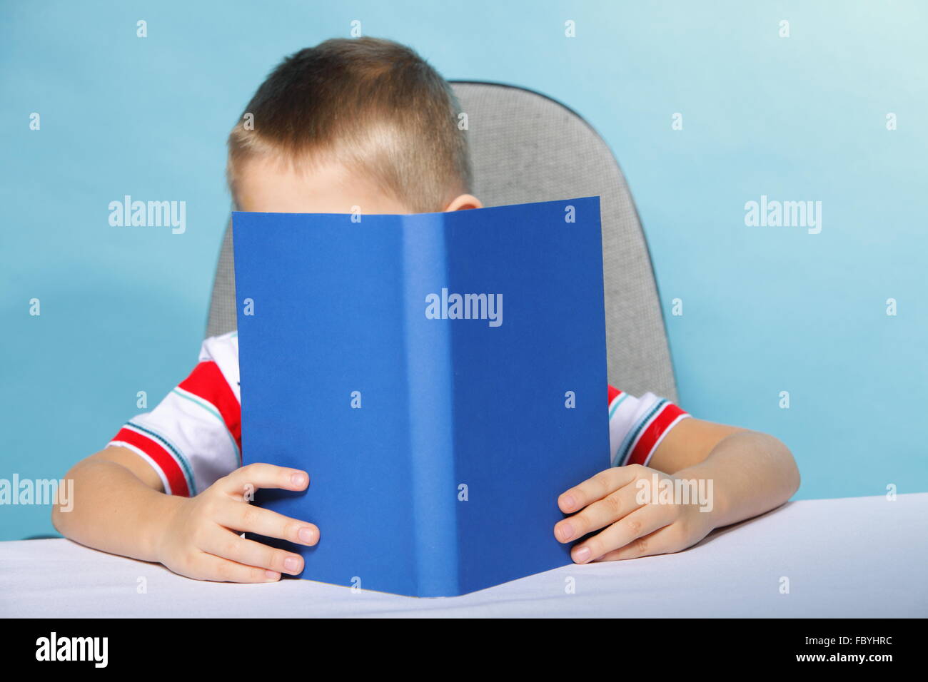 Schoolboy sitting hi-res stock photography and images - Alamy