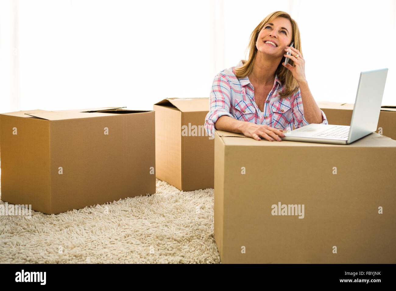 Woman calling someone Stock Photo - Alamy