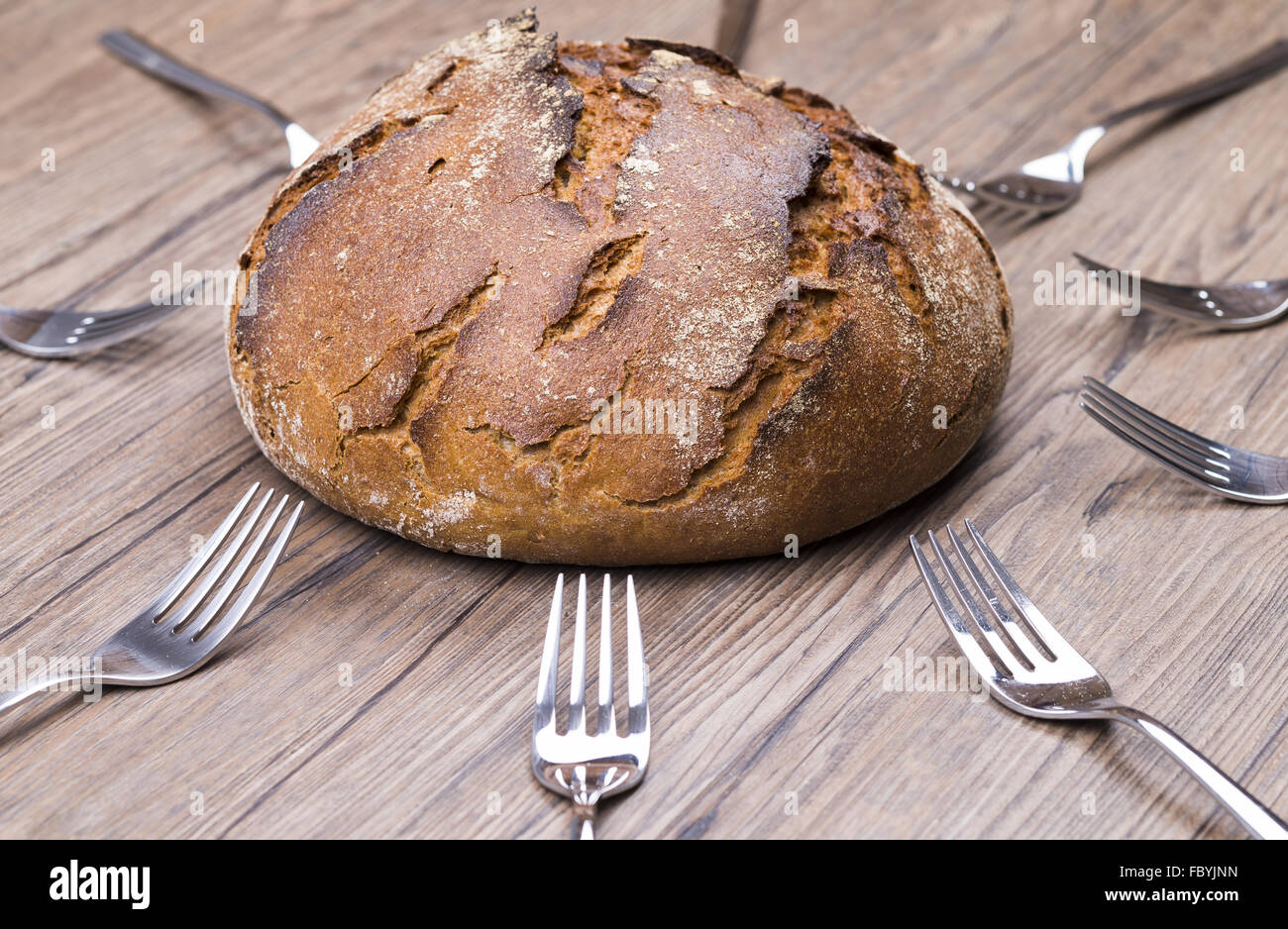 Bread and fork Stock Photo - Alamy