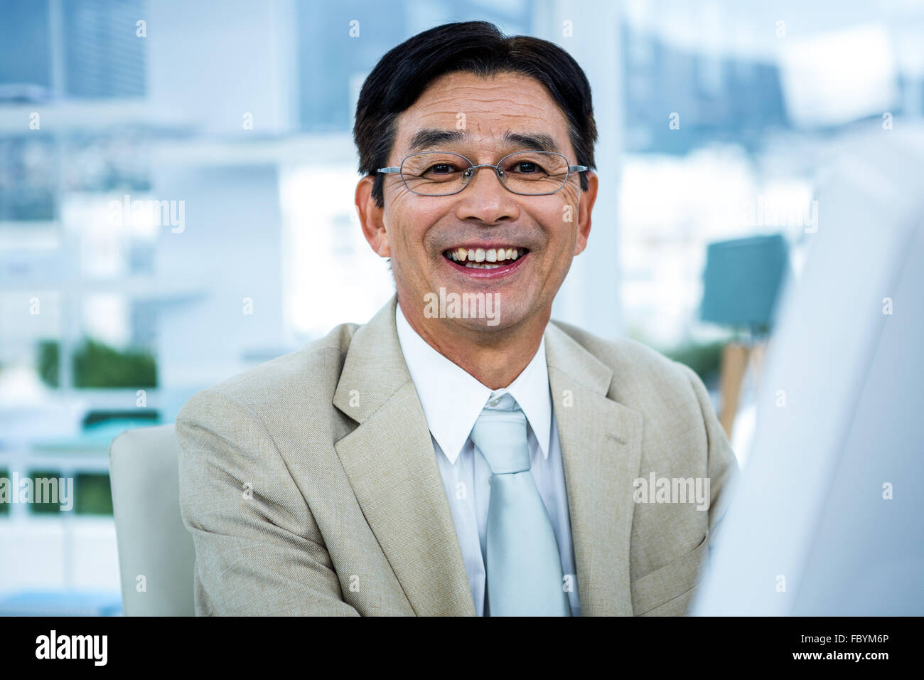 Portrait of a smiling businessman Stock Photo - Alamy