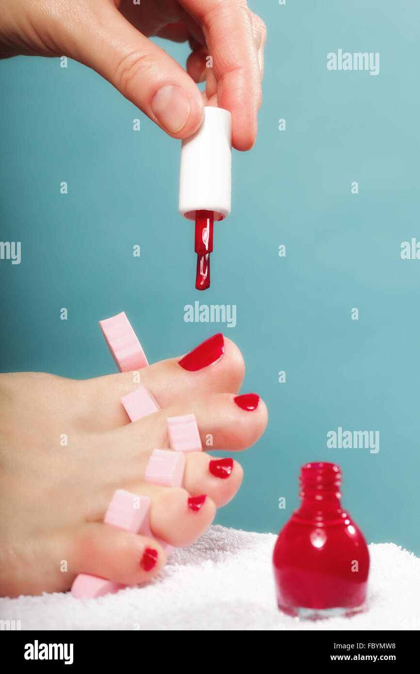 Red toenails hi-res stock photography and images - Alamy