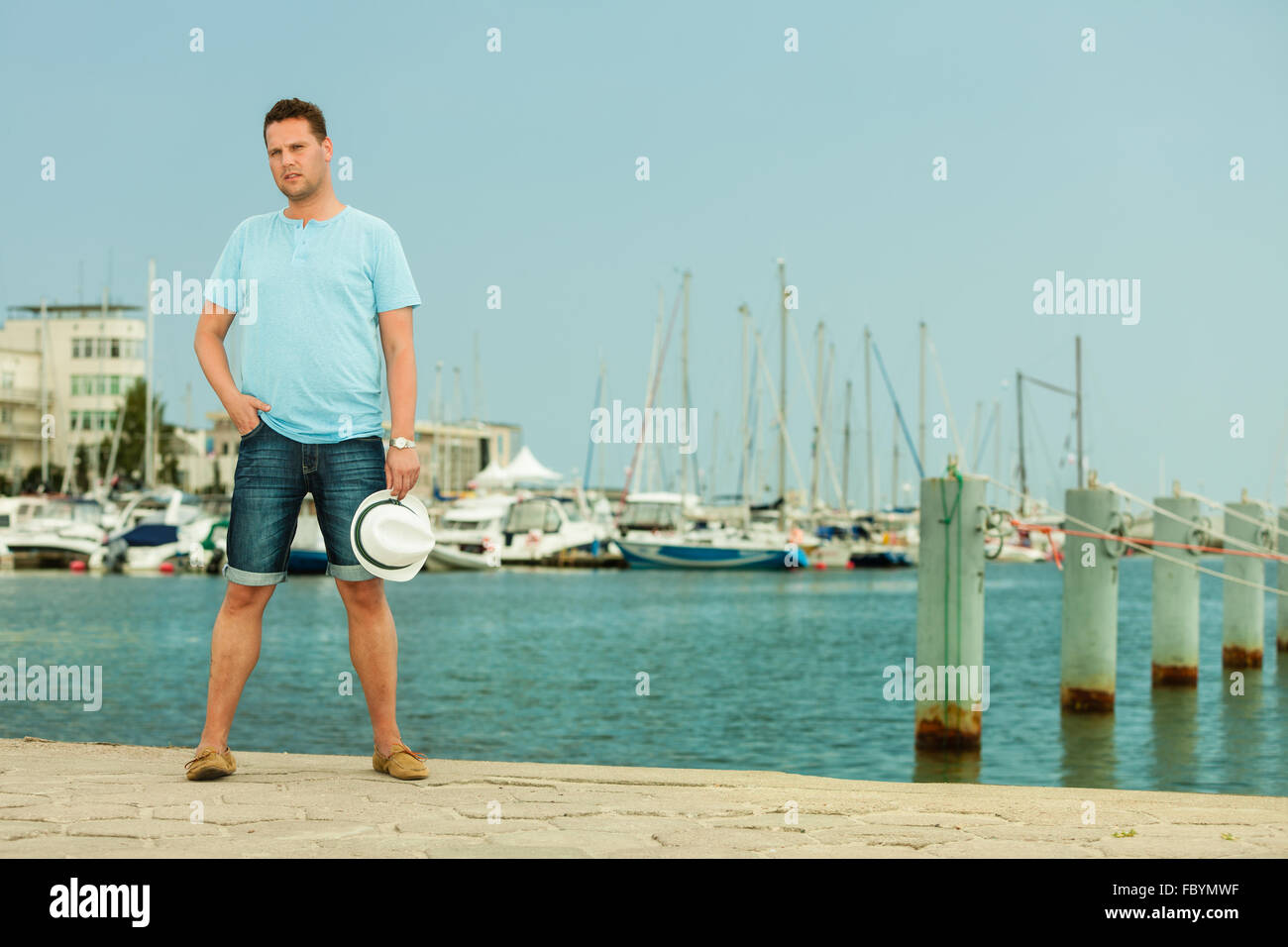 Boy at docks hi-res stock photography and images - Alamy