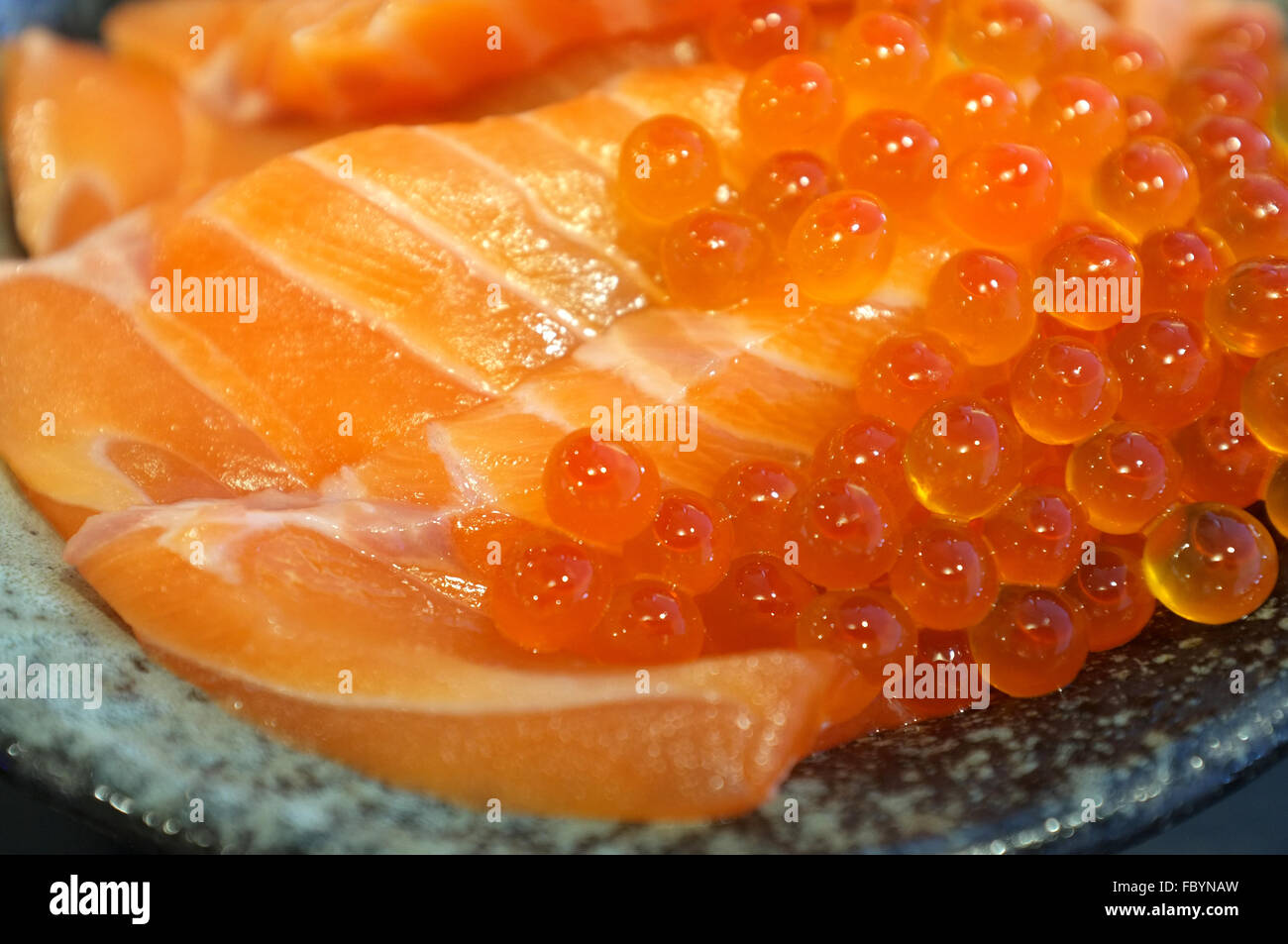 Raw and fresh salmon meat and salmon roe Stock Photo - Alamy