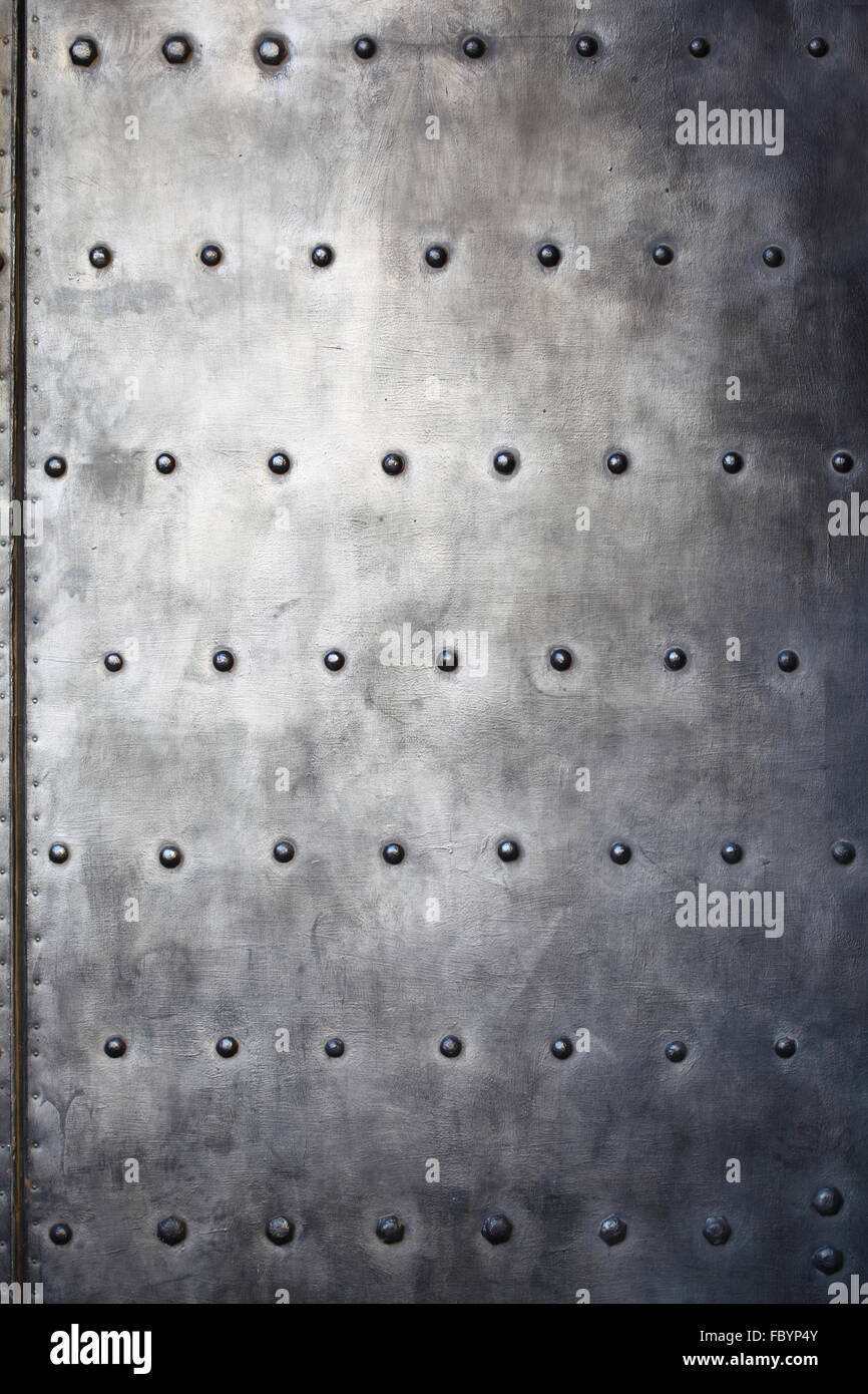 Grunge black metal plate rivets hi-res stock photography and images - Alamy