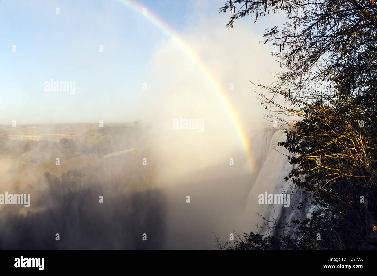 Rainbow Over Victoria Falls Stock Photo - Alamy