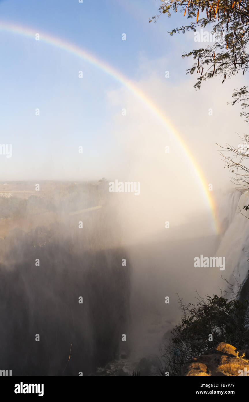 Rainbow Over Victoria Falls Stock Photo - Alamy