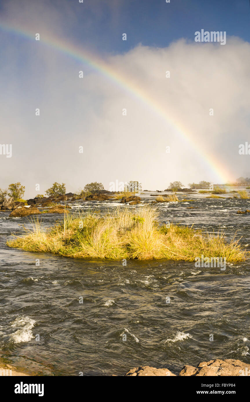 Rainbow Over Victoria Falls Stock Photo - Alamy