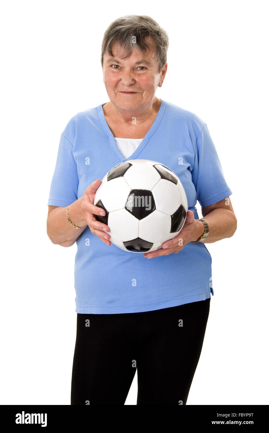 Old woman playing soccer hi-res stock photography and images - Alamy