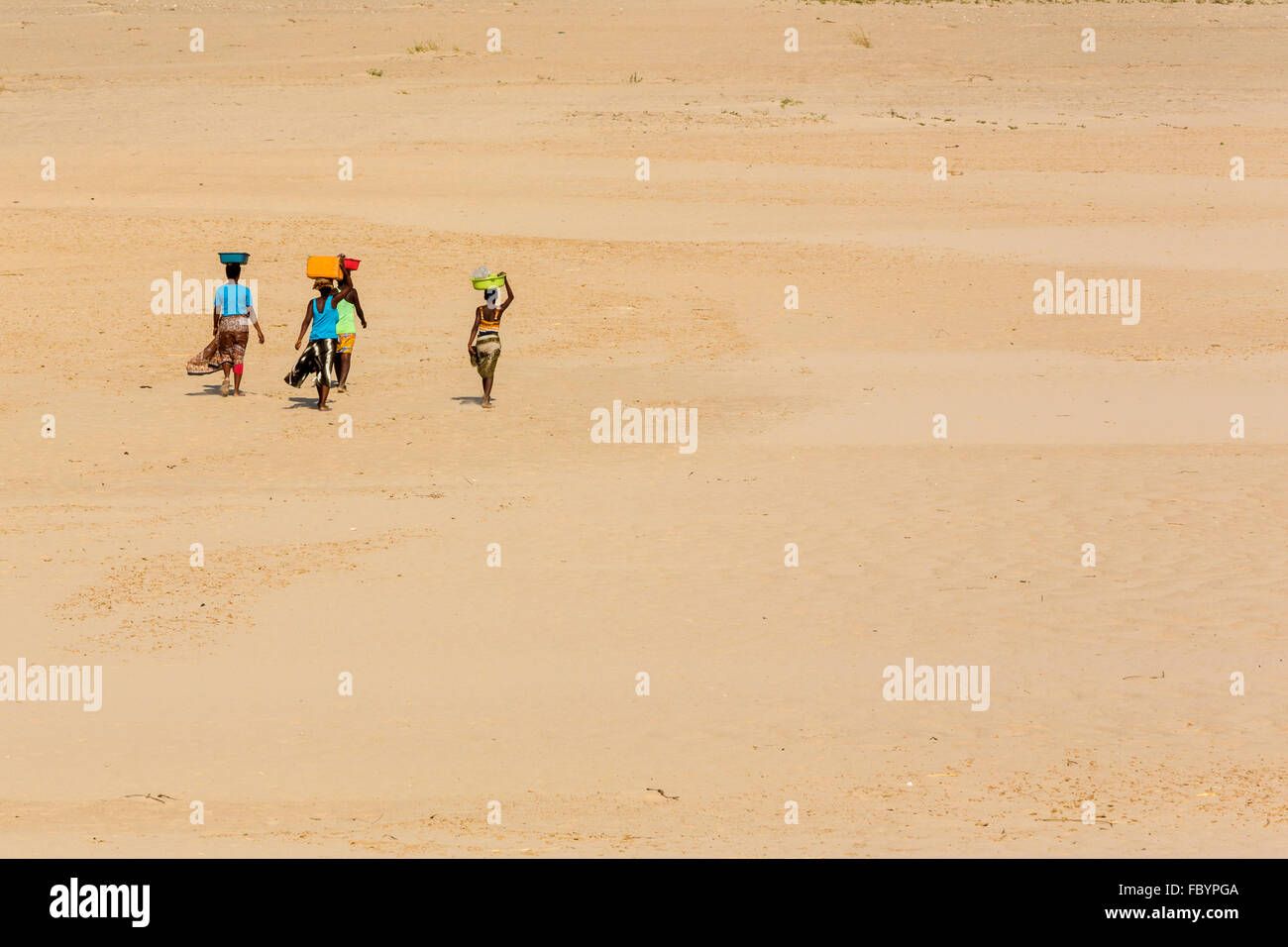People crossing the dryness Fiherenana river, Tulear, Madagascar Stock ...