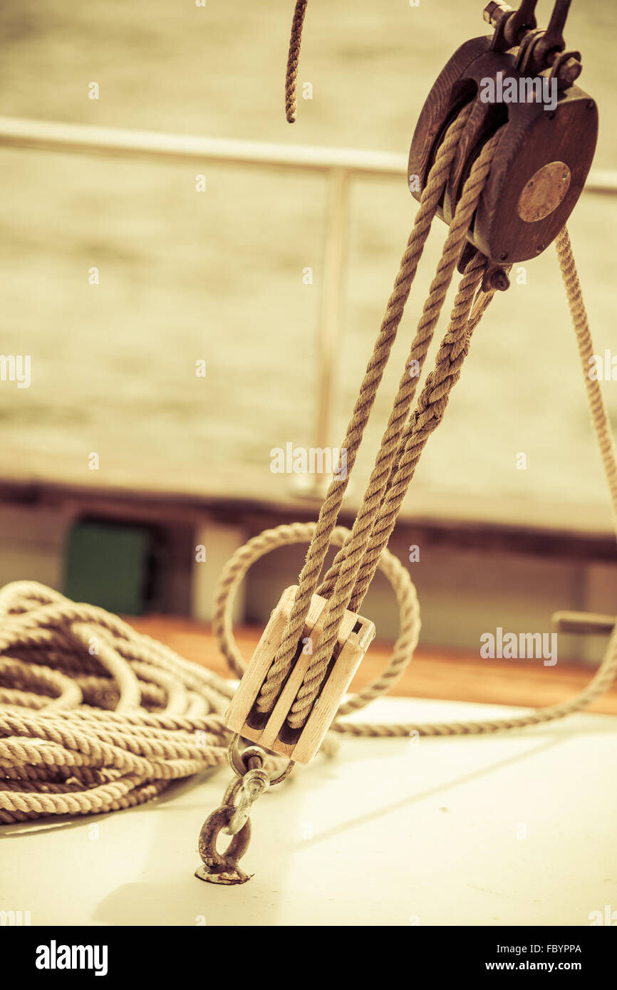 Yachting. Block with rope. Detail of a sailing boat Stock Photo - Alamy