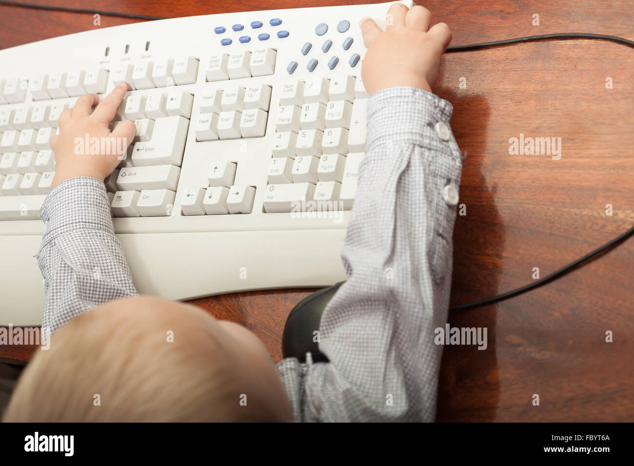 Child learning to use computer hi-res stock photography and images - Alamy