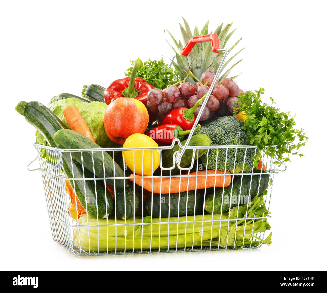 Wire shopping basket with groceries isolated on white background Stock ...