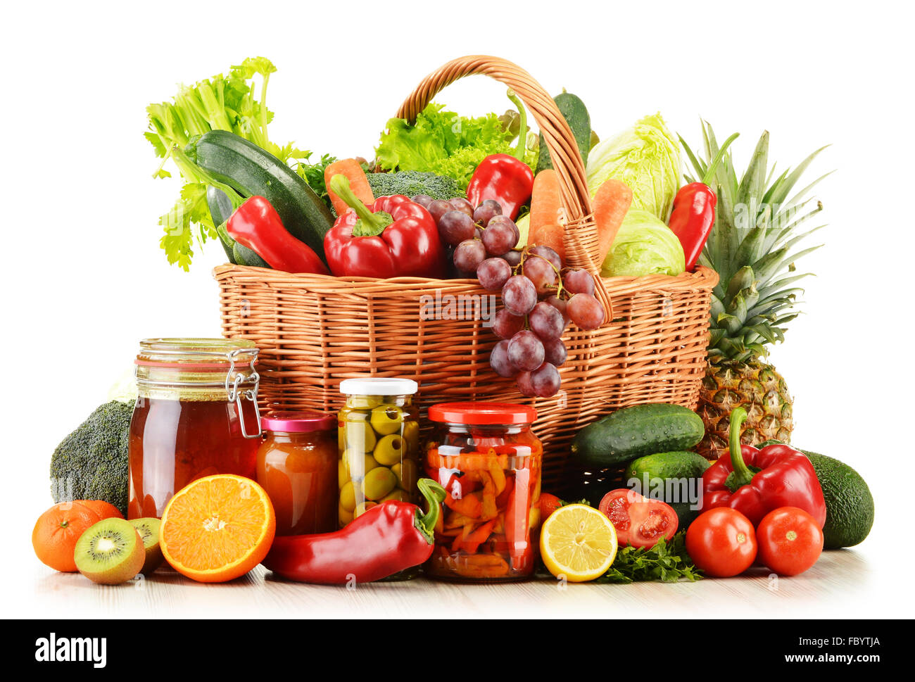 Wicker basket with groceries isolated on white background Stock Photo ...