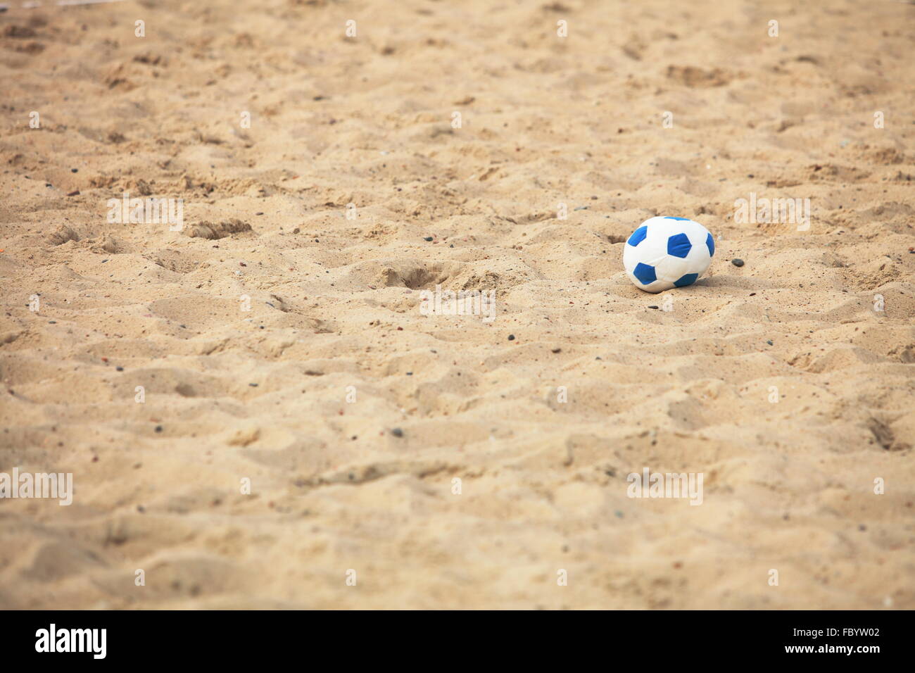 Ball on sandy beach hi-res stock photography and images - Alamy