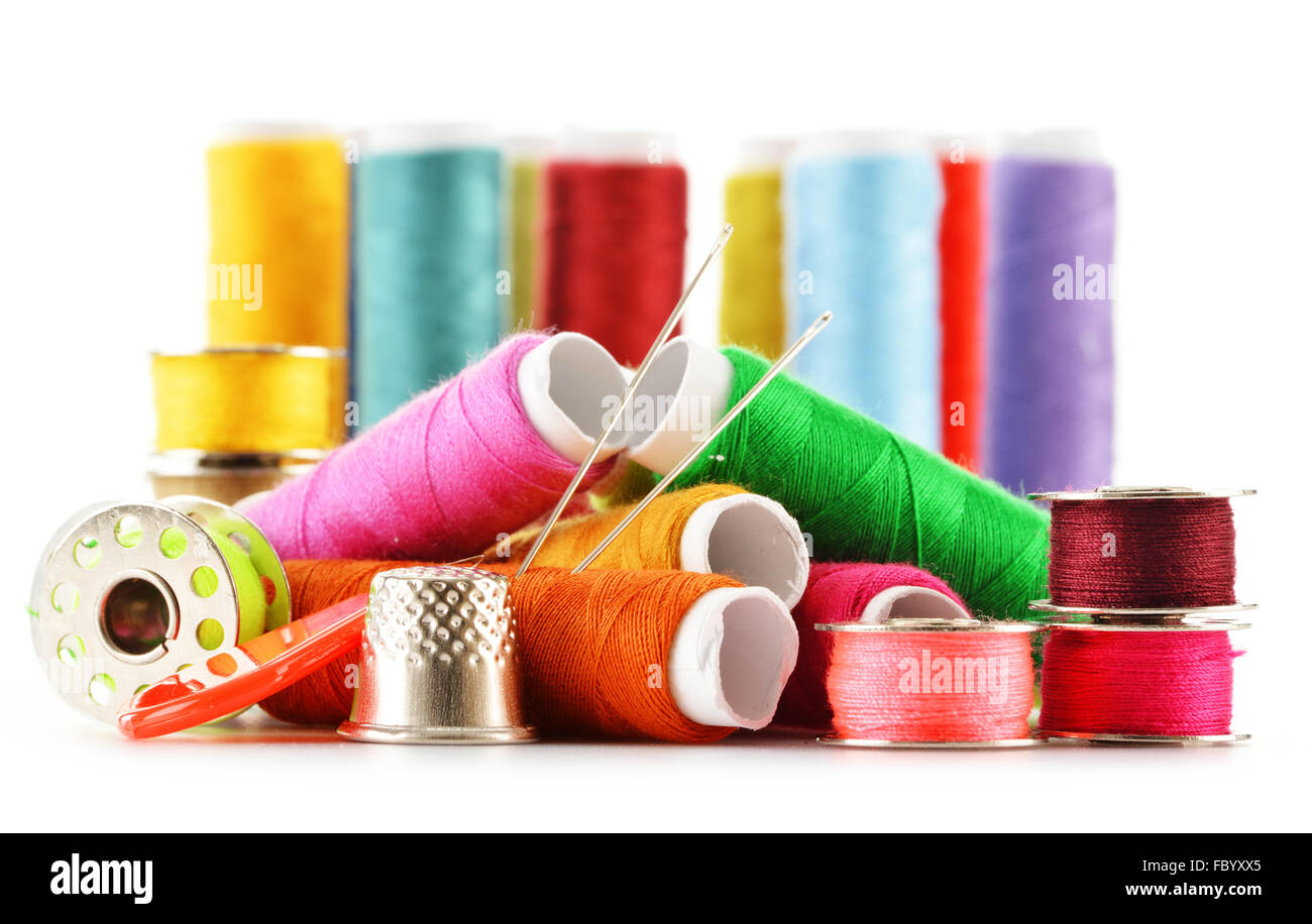 Tailor needles and threads over white background Stock Photo - Alamy