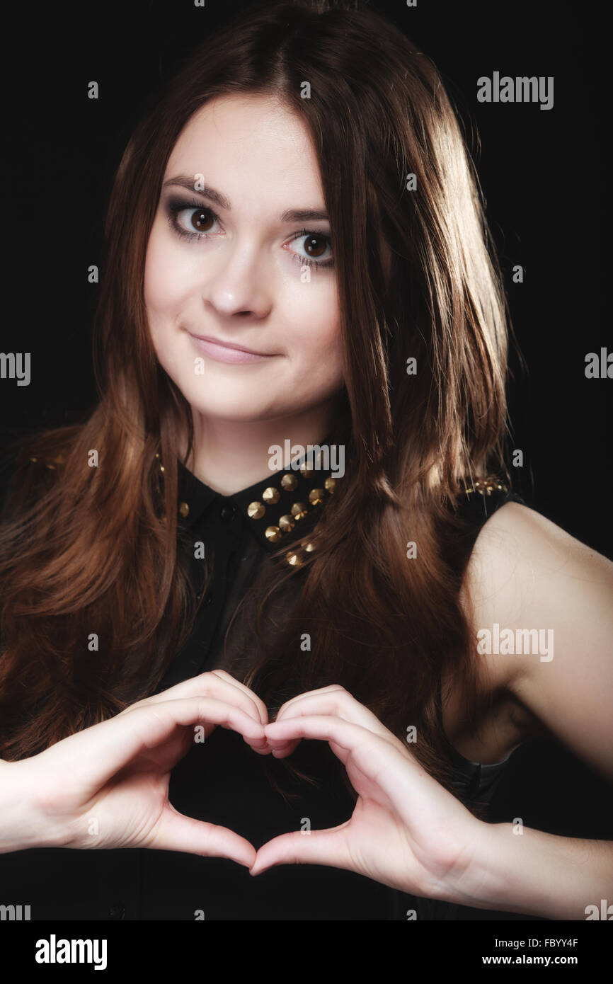 Girl doing hands heart hi-res stock photography and images - Alamy