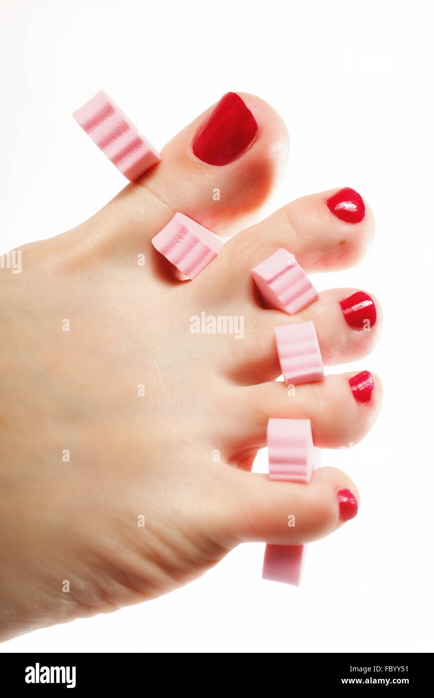Woman feet red toenails on hi-res stock photography and images - Alamy