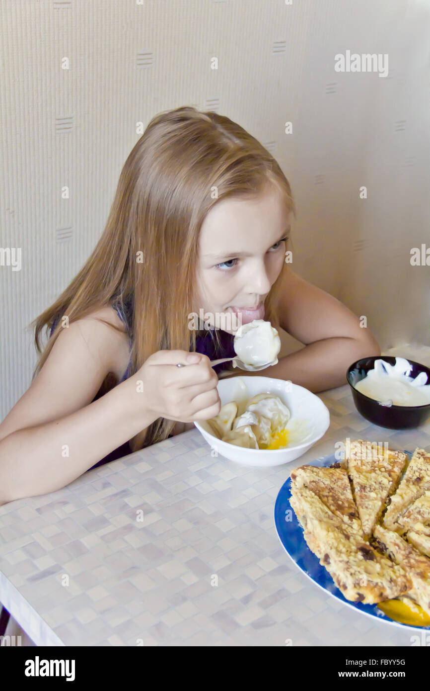 Eating cute girl Stock Photo - Alamy