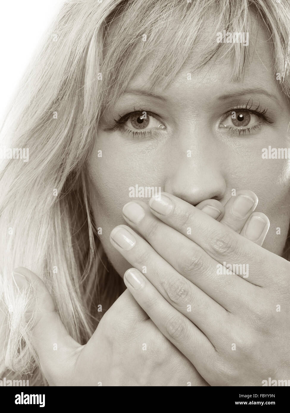 Woman hand over mouth mature hi-res stock photography and images - Alamy