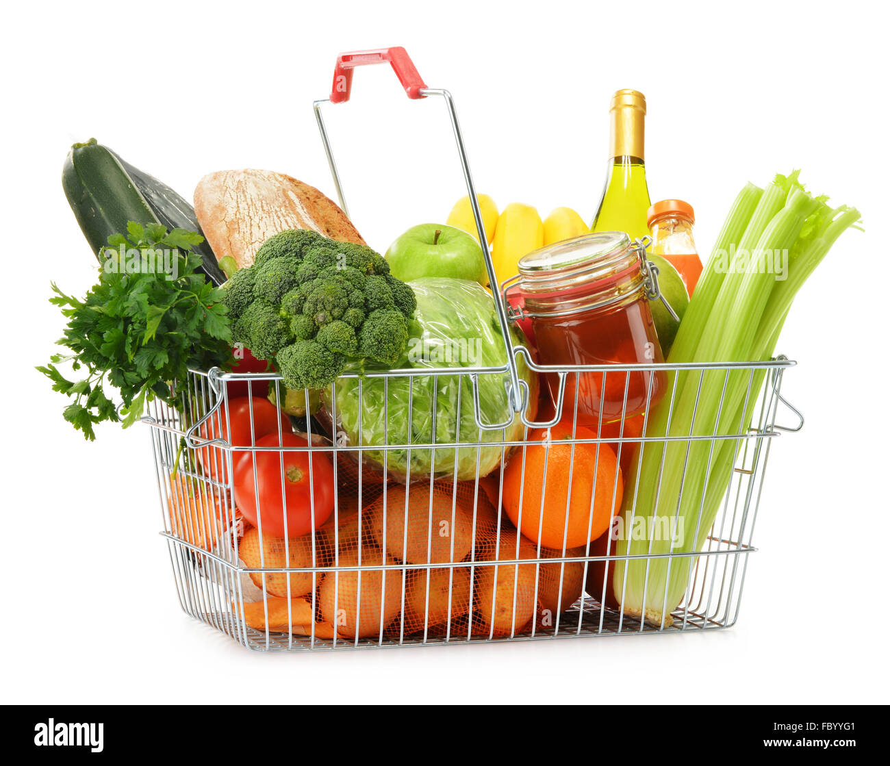 Wire shopping basket with groceries isolated on white Stock Photo - Alamy