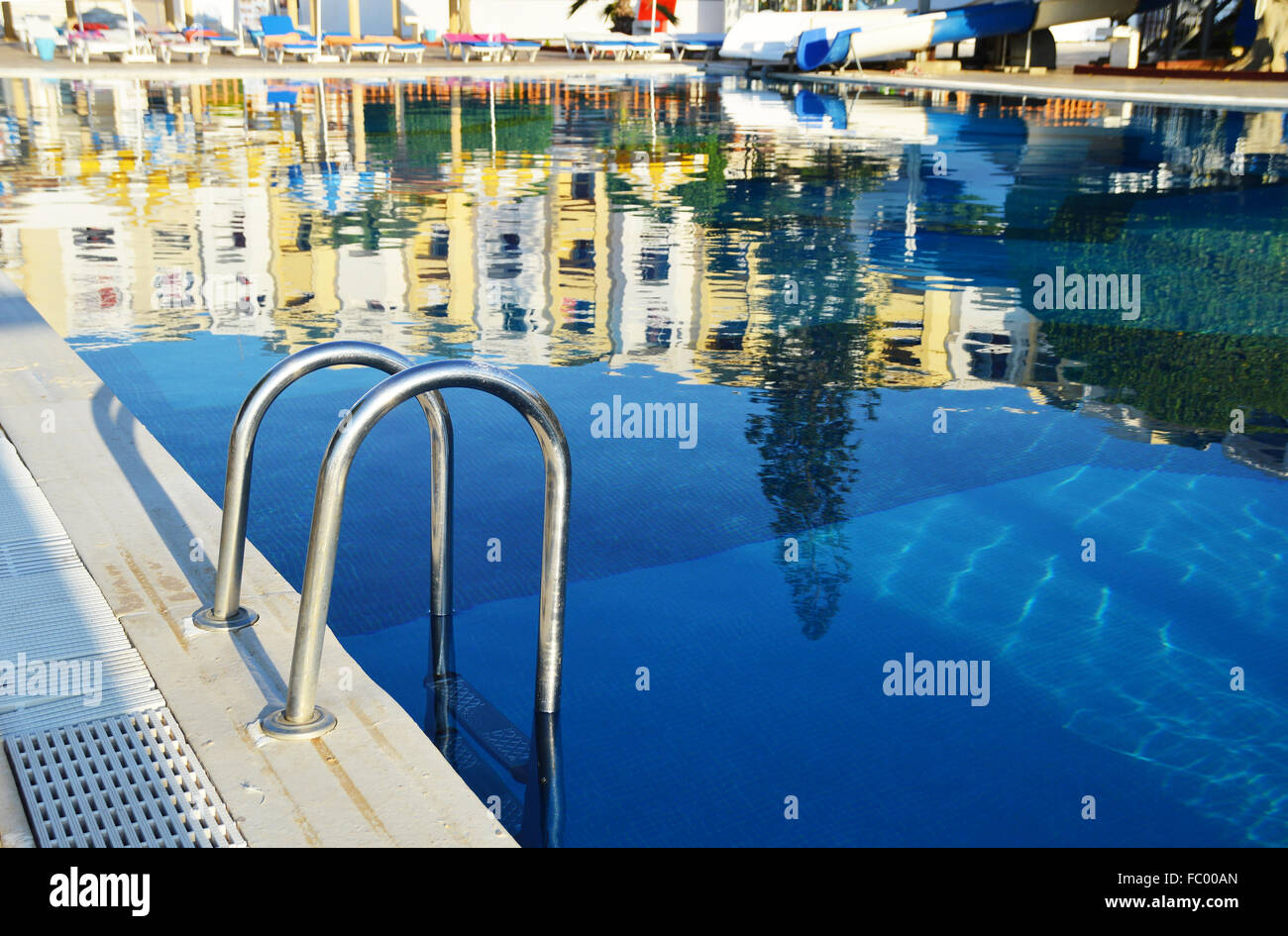 Swimming pool in touristic resort during summer time Stock Photo - Alamy