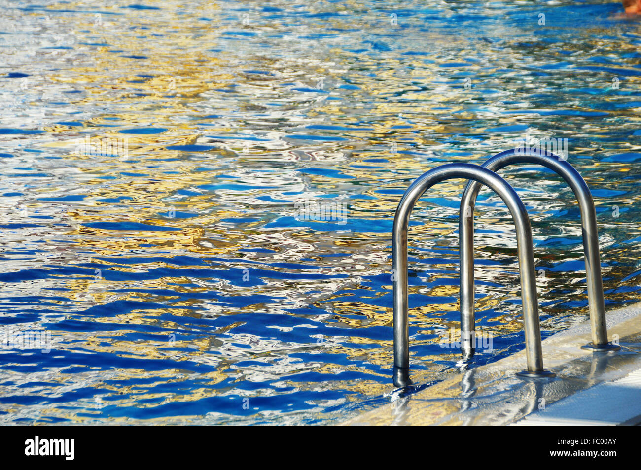 Swimming pool in touristic resort during summer time Stock Photo - Alamy