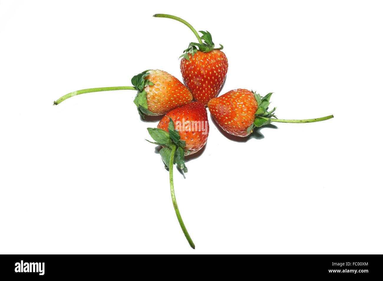 Three large strawberries hi-res stock photography and images - Alamy