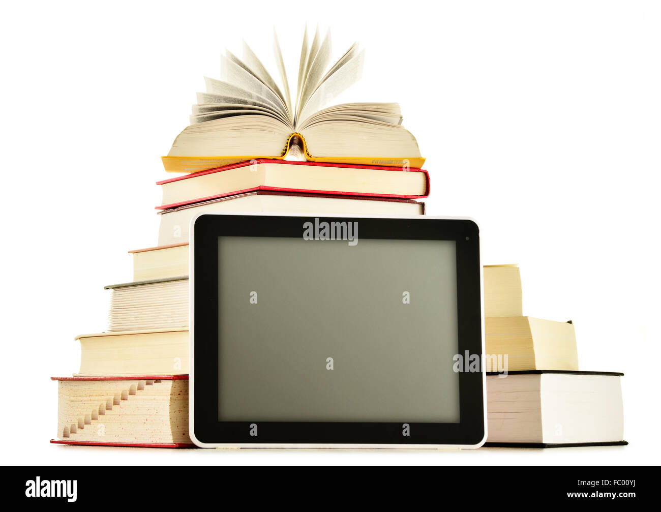 Composition with books and tablet computer isolated on white background ...