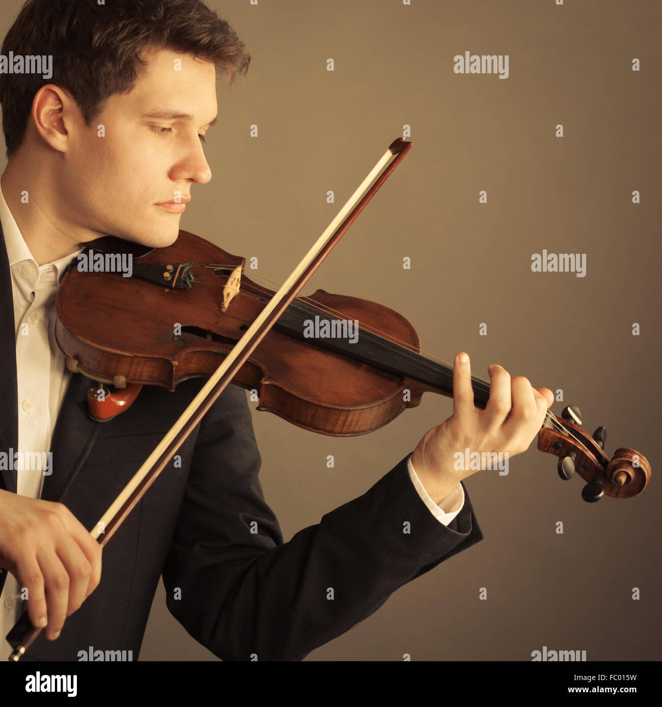 Artist playing classical musical instrument hi-res stock photography ...
